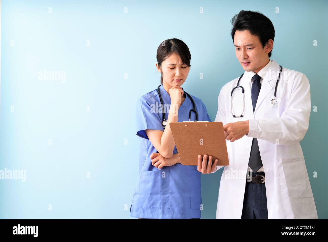 Japanese male, female doctor Stock Photo - Alamy