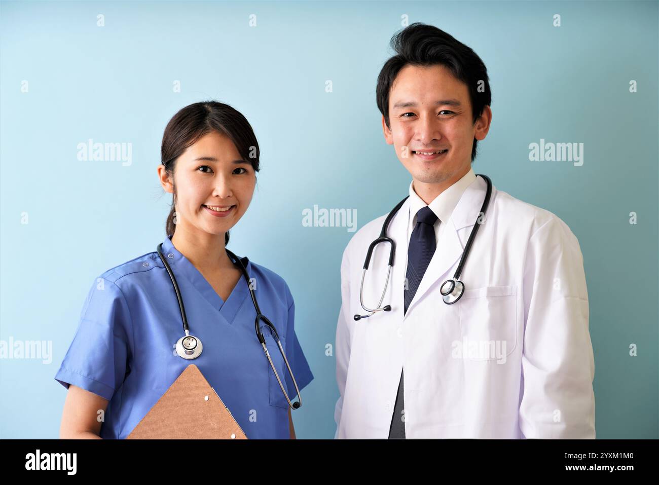 Japanese male, female doctor Stock Photo - Alamy