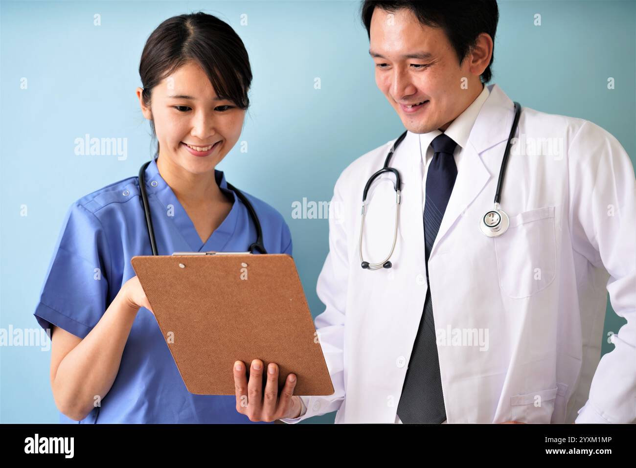 Japanese male, female doctor Stock Photo - Alamy