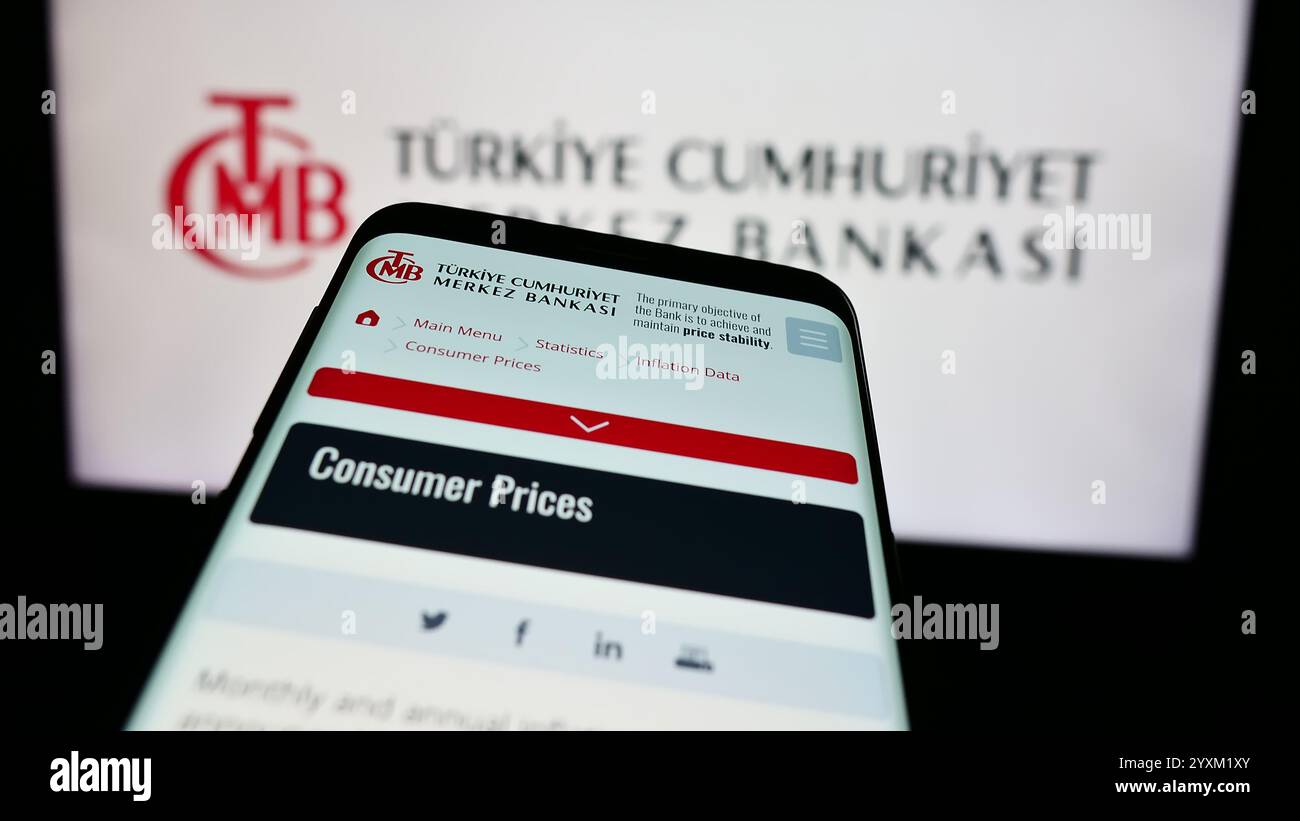 In this photo illustration, a smartphone with the website of Central Bank of the Republic of ...