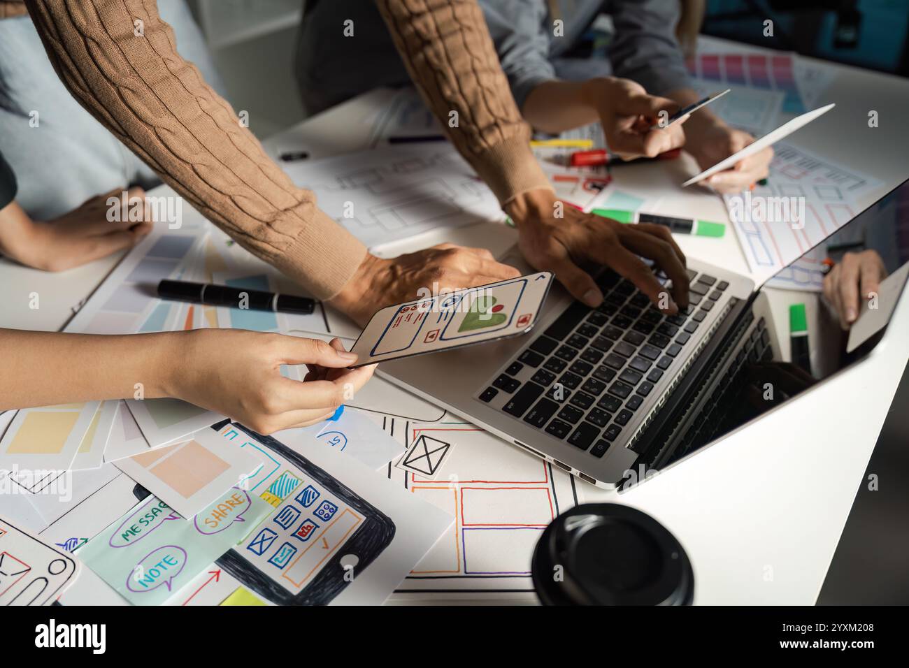 Creative Ux Ui Design Process With Team Collaborating On Mobile App Interface Prototypes And