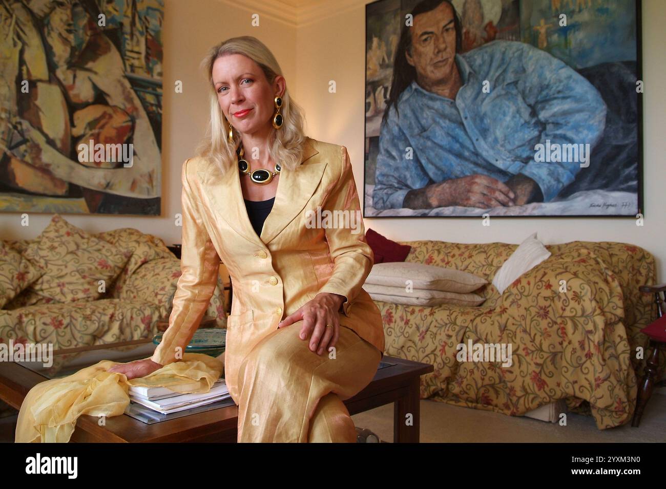 Frieda Hughes (daughter of Ted Hughes) in her house with her picture of ...