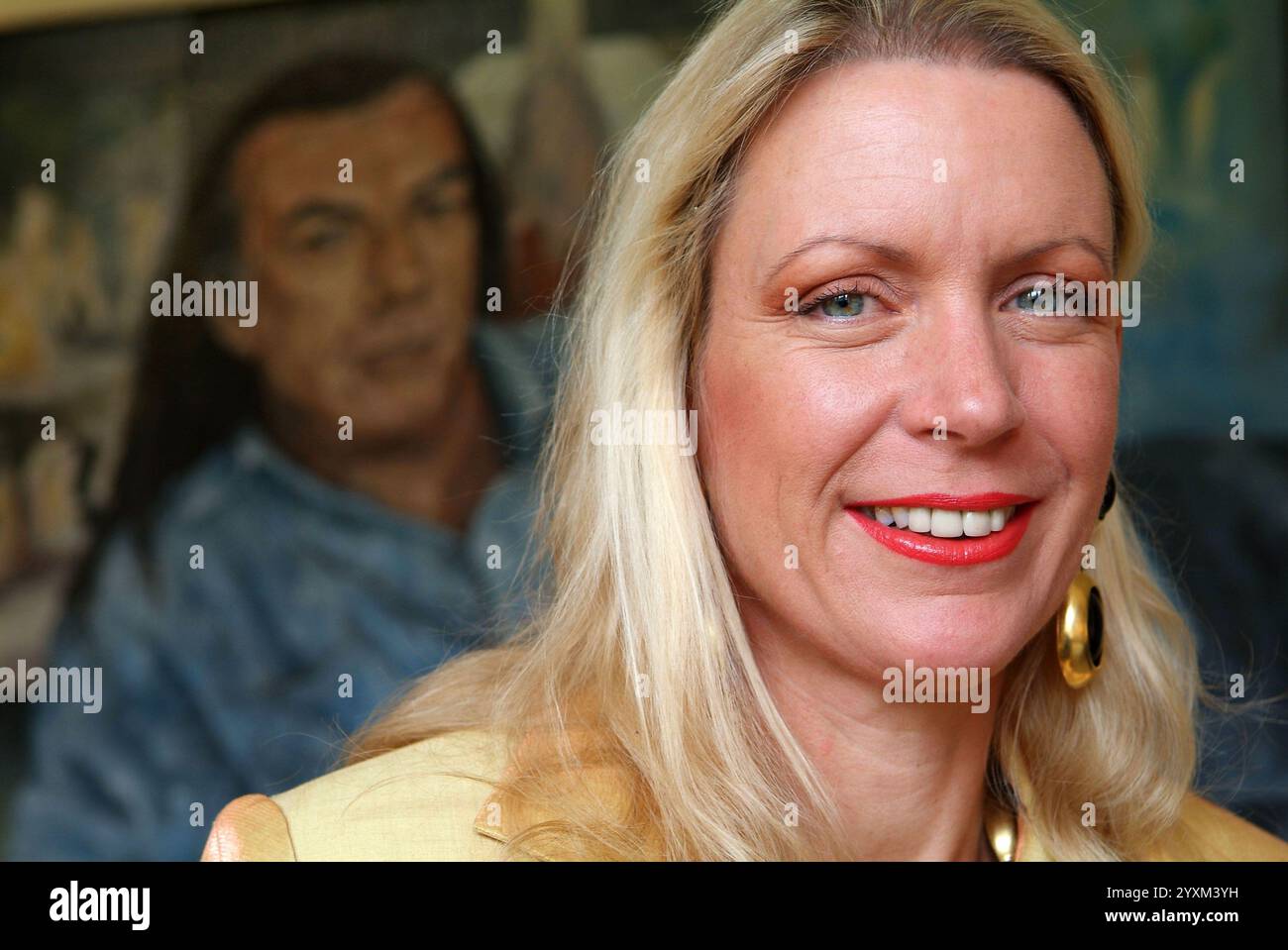 Frieda Hughes (daughter of Ted Hughes) in her house with her picture of ...
