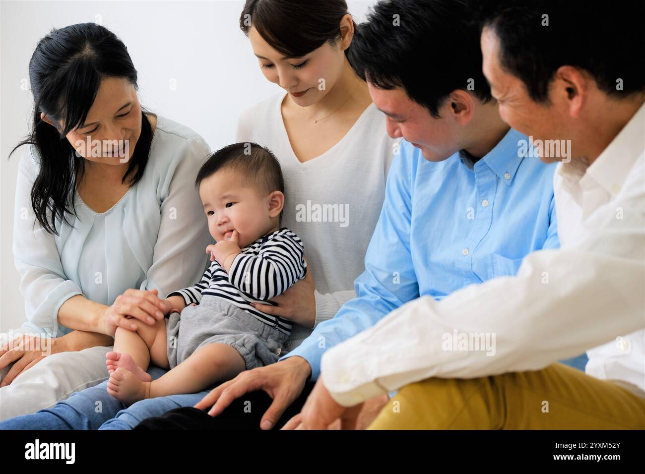 Three generation family Stock Photo - Alamy