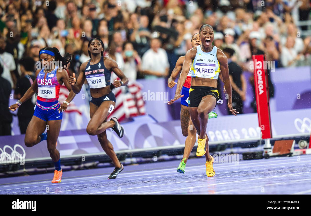 Julien Alfred winning in the 100 meters relay at the Paris 2024 Olympic ...