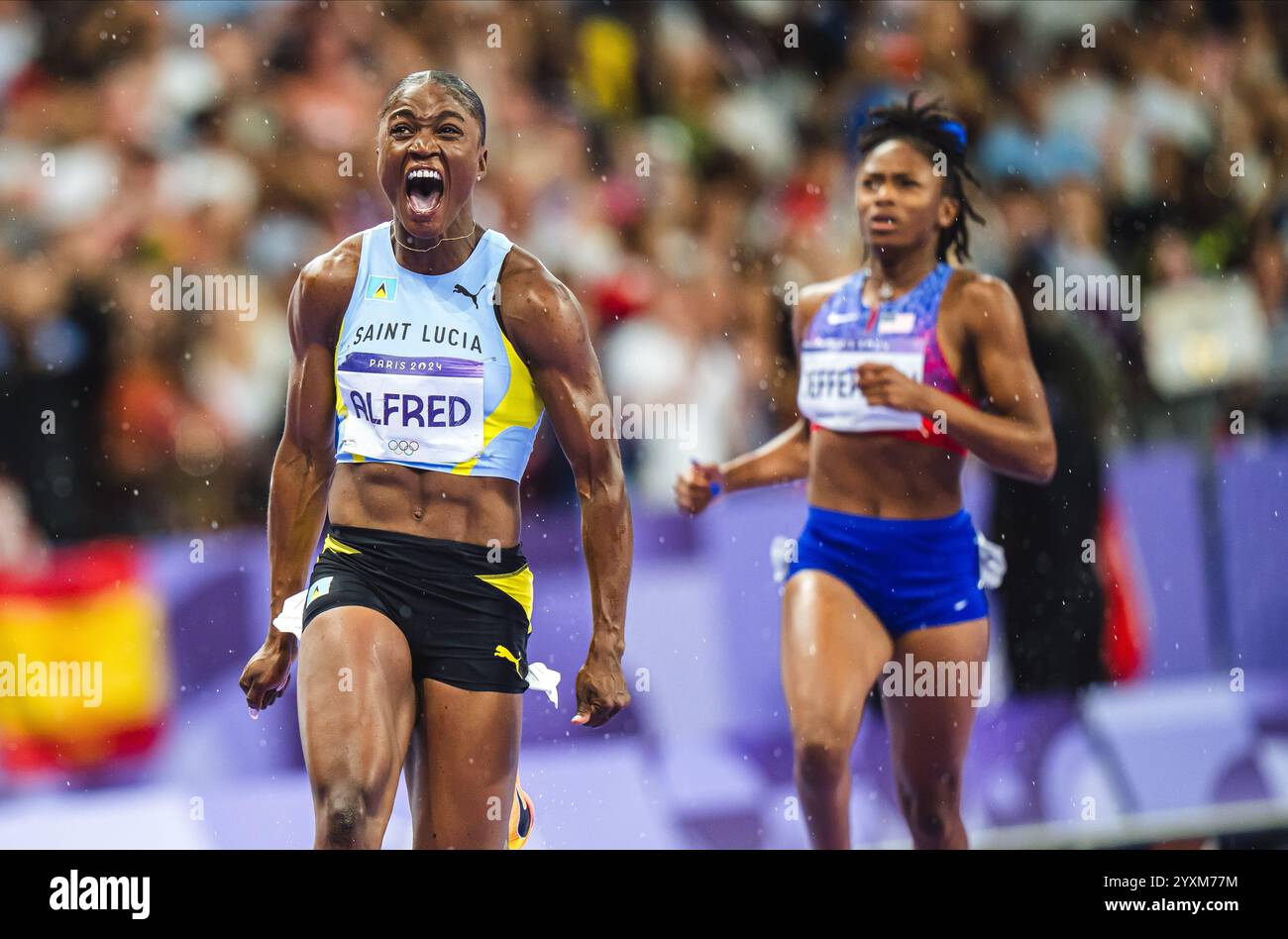 Julien Alfred winning in the 100 meters relay at the Paris 2024 Olympic ...
