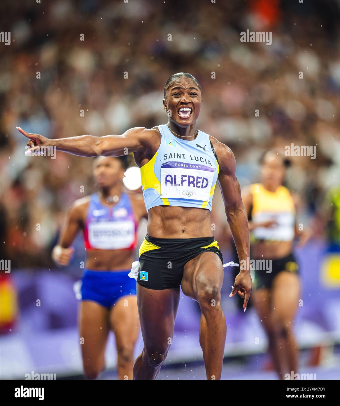 Julien Alfred winning in the 100 meters relay at the Paris 2024 Olympic ...