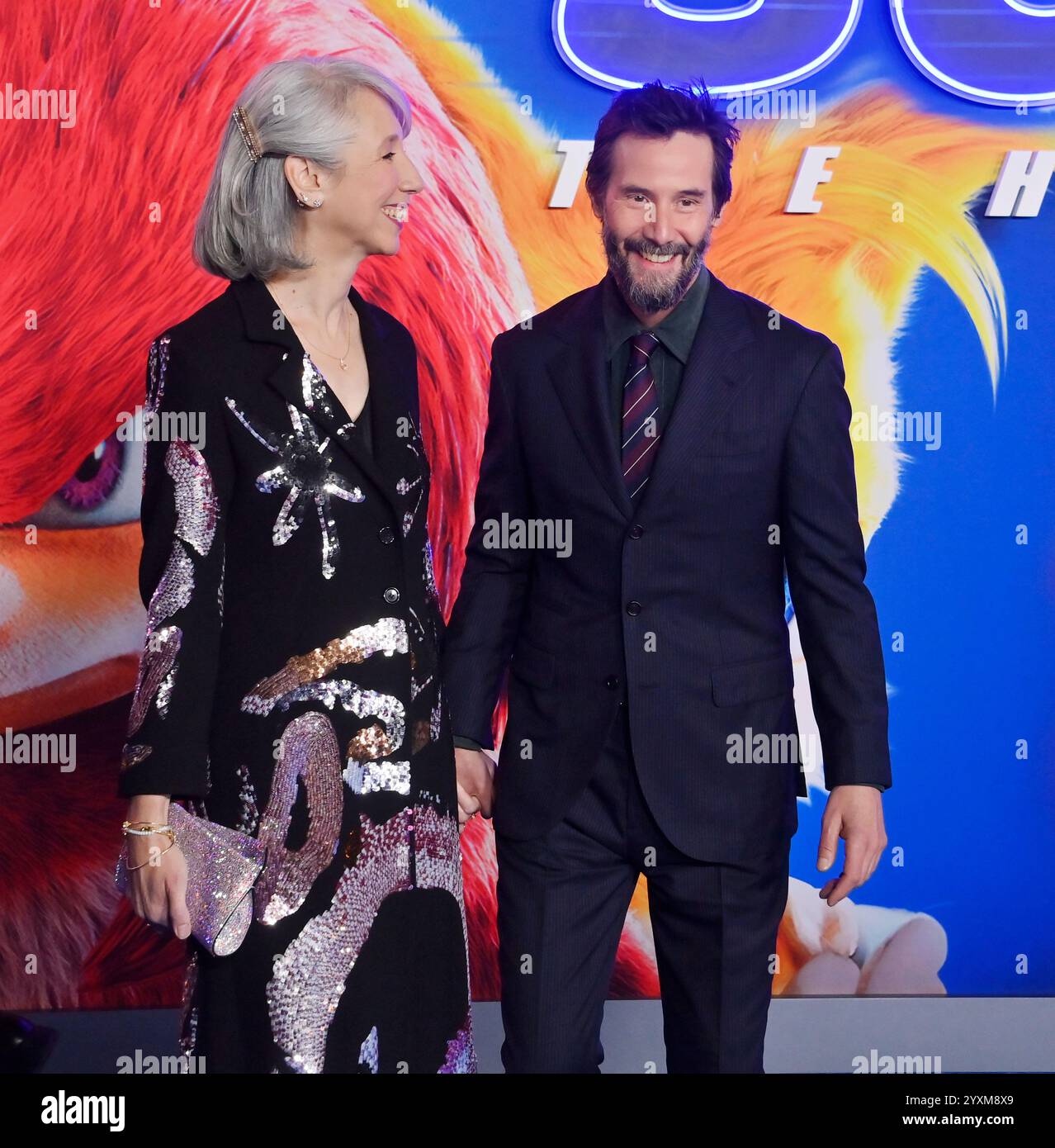 Cast member Keanu Reeves (R) and American visual artist Alexandra Grant ...