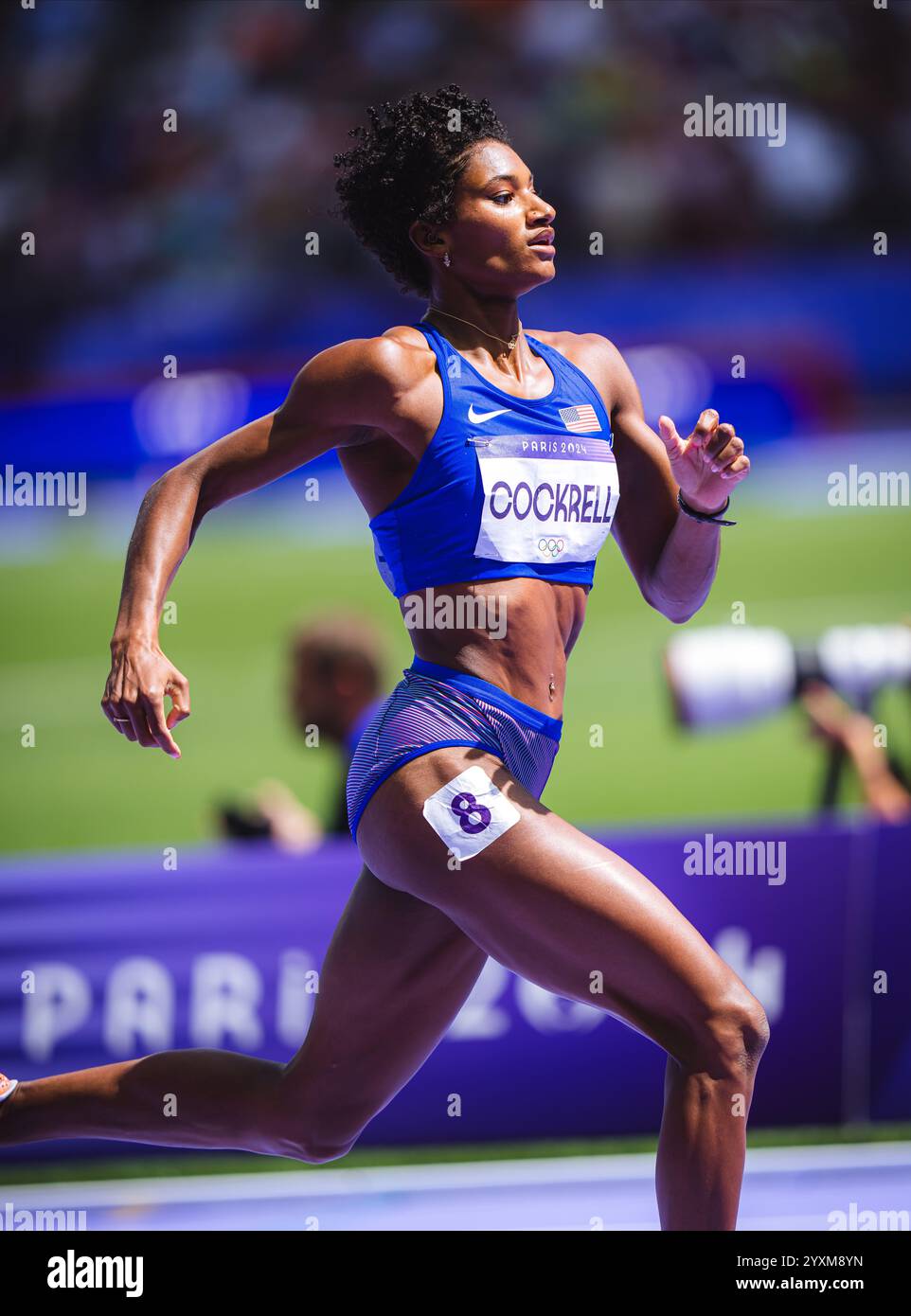 Anna Cockrell participating in the 400 meters hurdles at the Paris 2024 ...