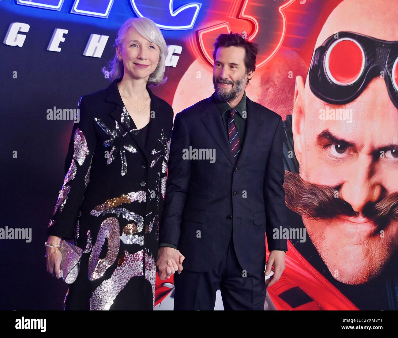 Cast member Keanu Reeves (R) and American visual artist Alexandra Grant ...