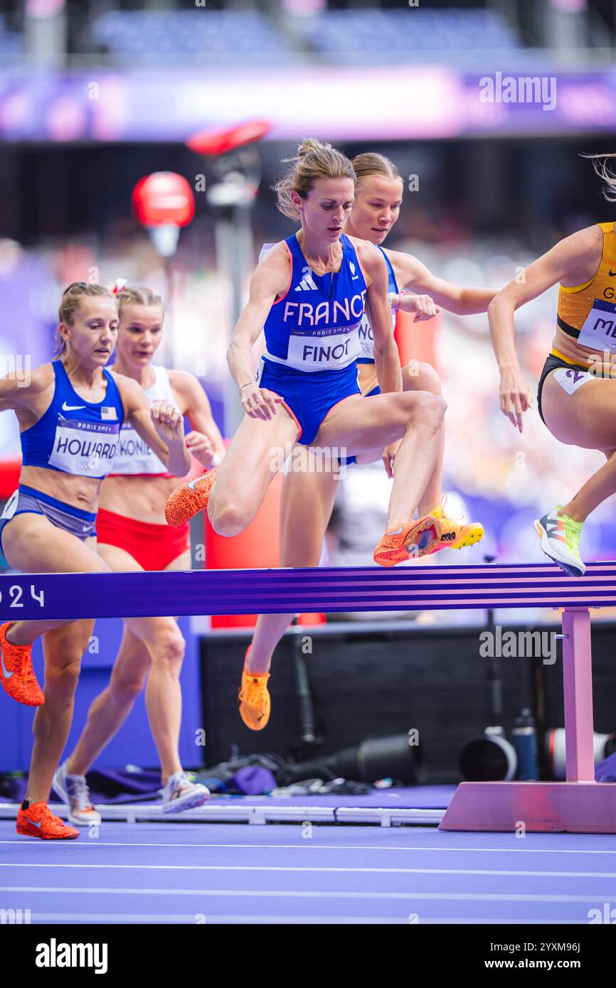 Alice Finot participating in the 3000 metres steeplechase at the Paris ...