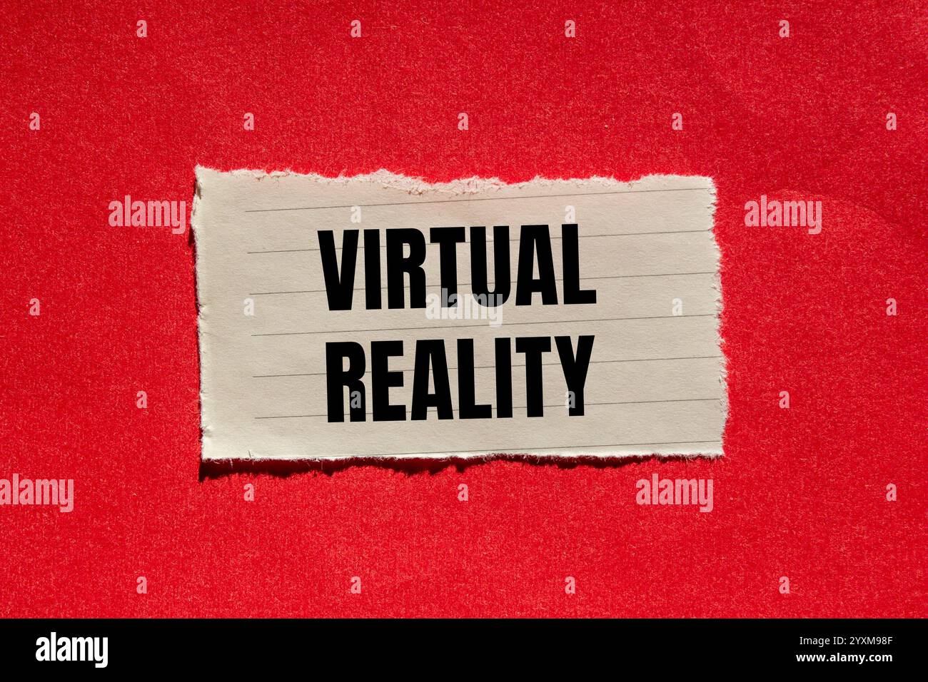 Virtual reality message written on ripped torn paper piece with red ...