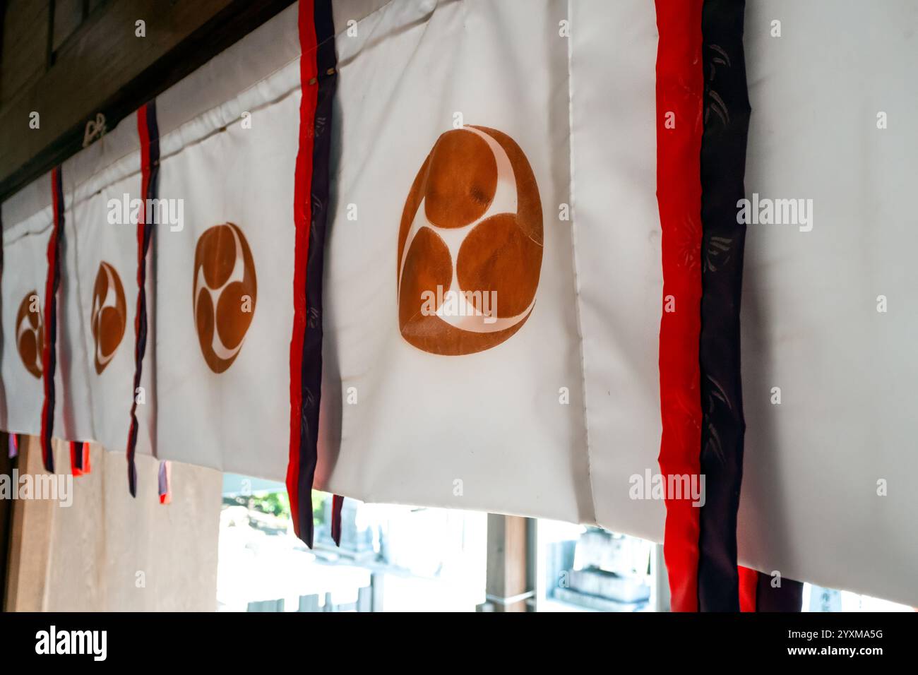 Spiral Japanese shrine symbol at the entrance of a Shinto shrine Stock ...