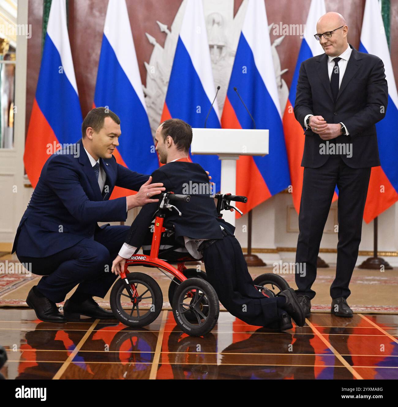 From left to right: Minister of Sports Mikhail Degtyarev, two-time silver medalist of the 2024 ...