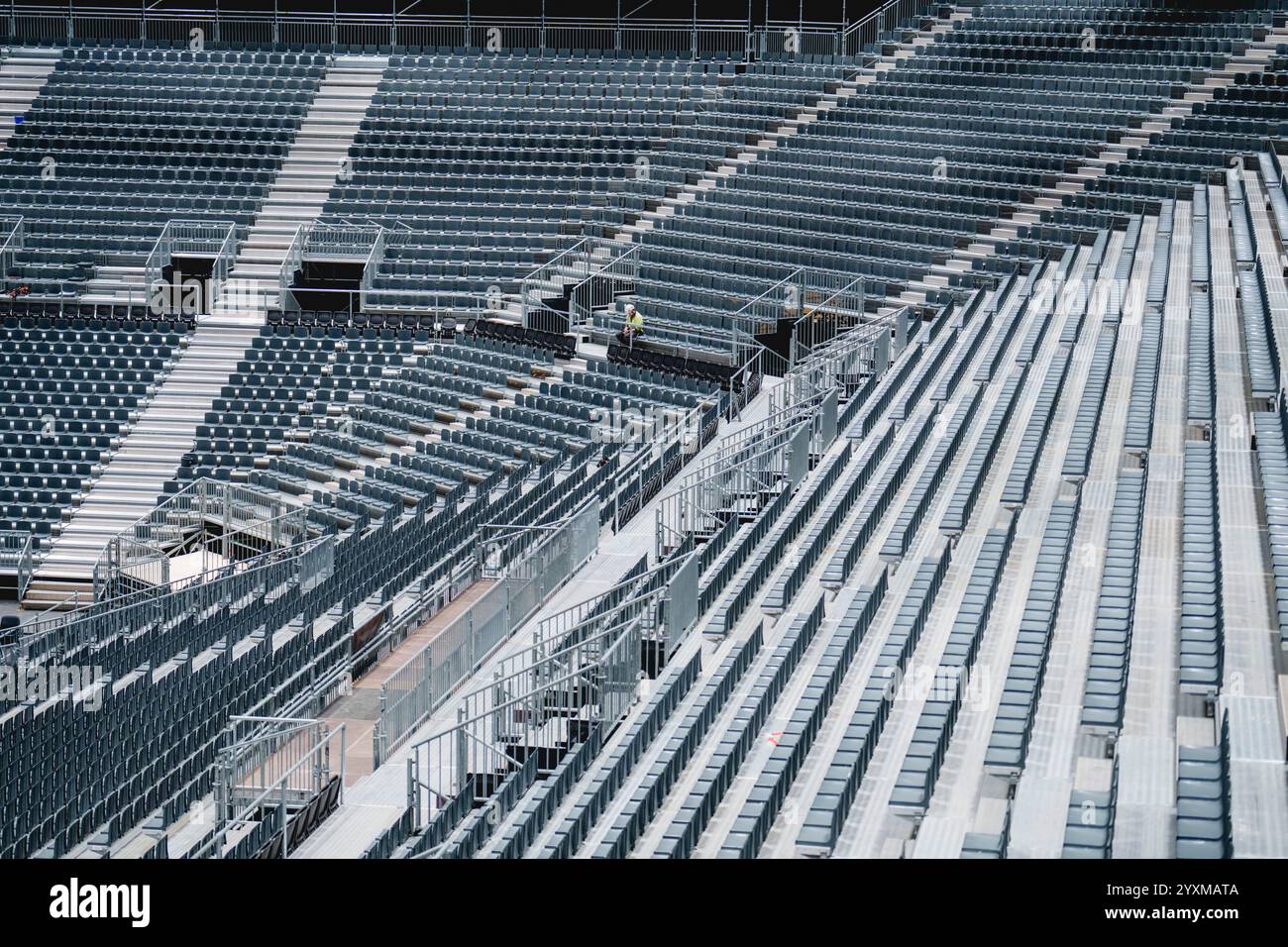 Fornebu 20241217. Workers are working to set up the stands before the ...