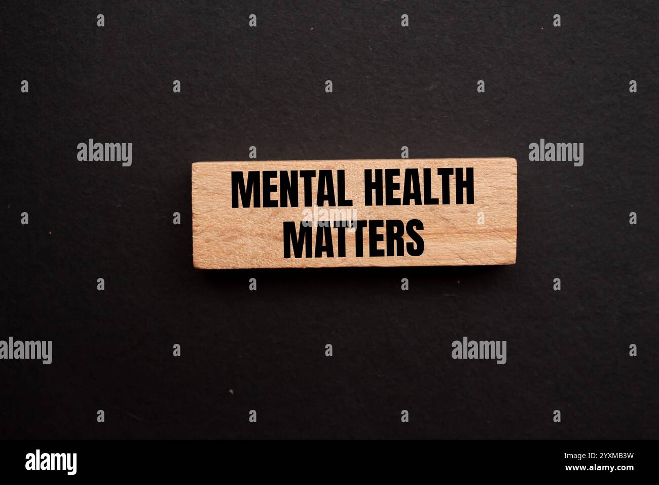 Mental health matters message written on wooden block with black ...