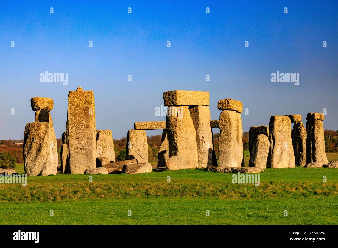 Winter sun at the prehistoric megalithic stone circle at Stonehenge on ...