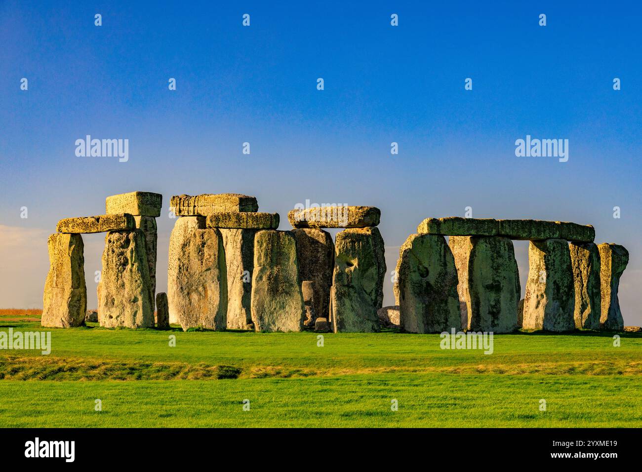 Winter sun at the prehistoric megalithic stone circle at Stonehenge on ...