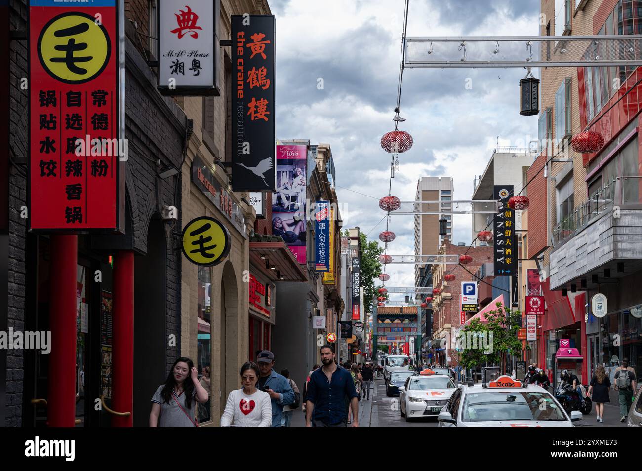People walking down chinatown alleyway hi-res stock photography and ...