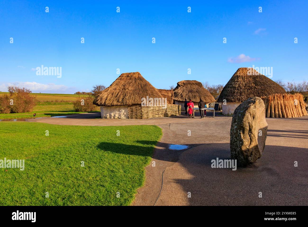 Replica thatched Neolithic houses outside the visitor centre at ...