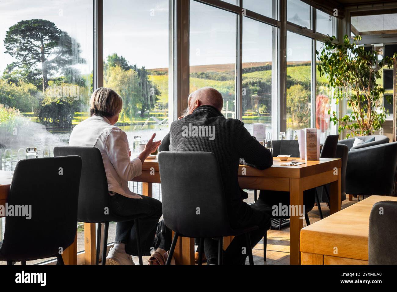 Customers sitting inside the Lakeside Cafe Restaurant in Newquay in ...