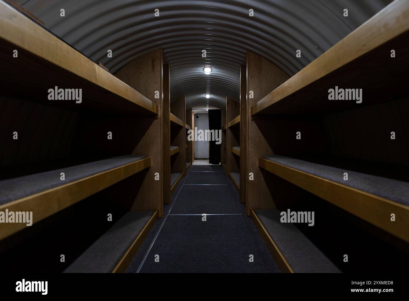 Bunk beds are seen inside an underground shelter in an undisclosed ...