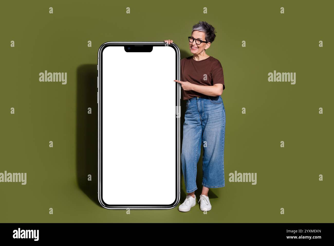 Full size photo of lovely pensioner lady point big smartphone dressed ...