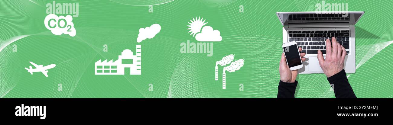 Top view of hands using laptop and mobile phone with symbol of air ...