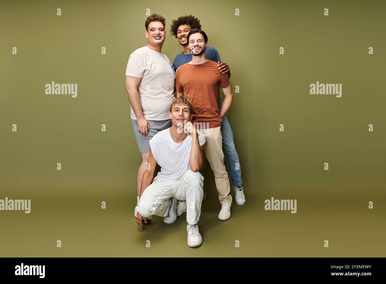 Four individuals celebrate diversity and pride with smiles in a vibrant ...