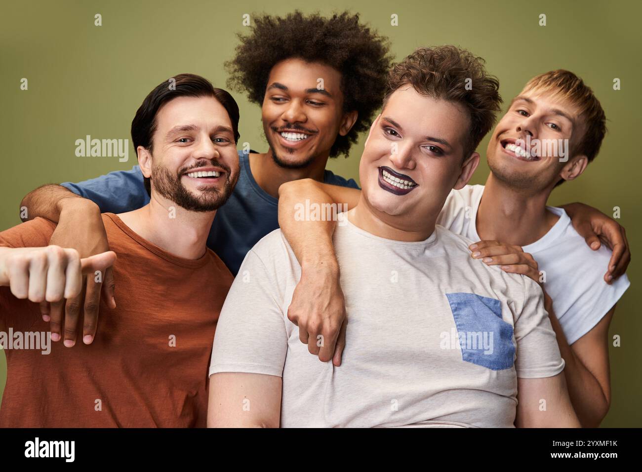 Four friends pose, celebrating their vibrant personalities and unique ...