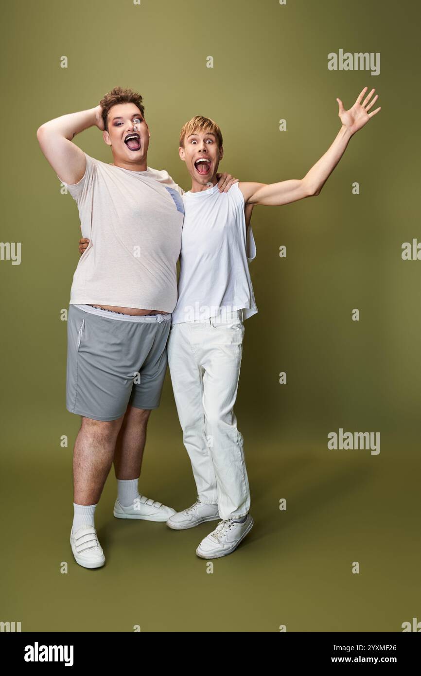 Two happy queer friends pose joyfully, showcasing their vibrant ...