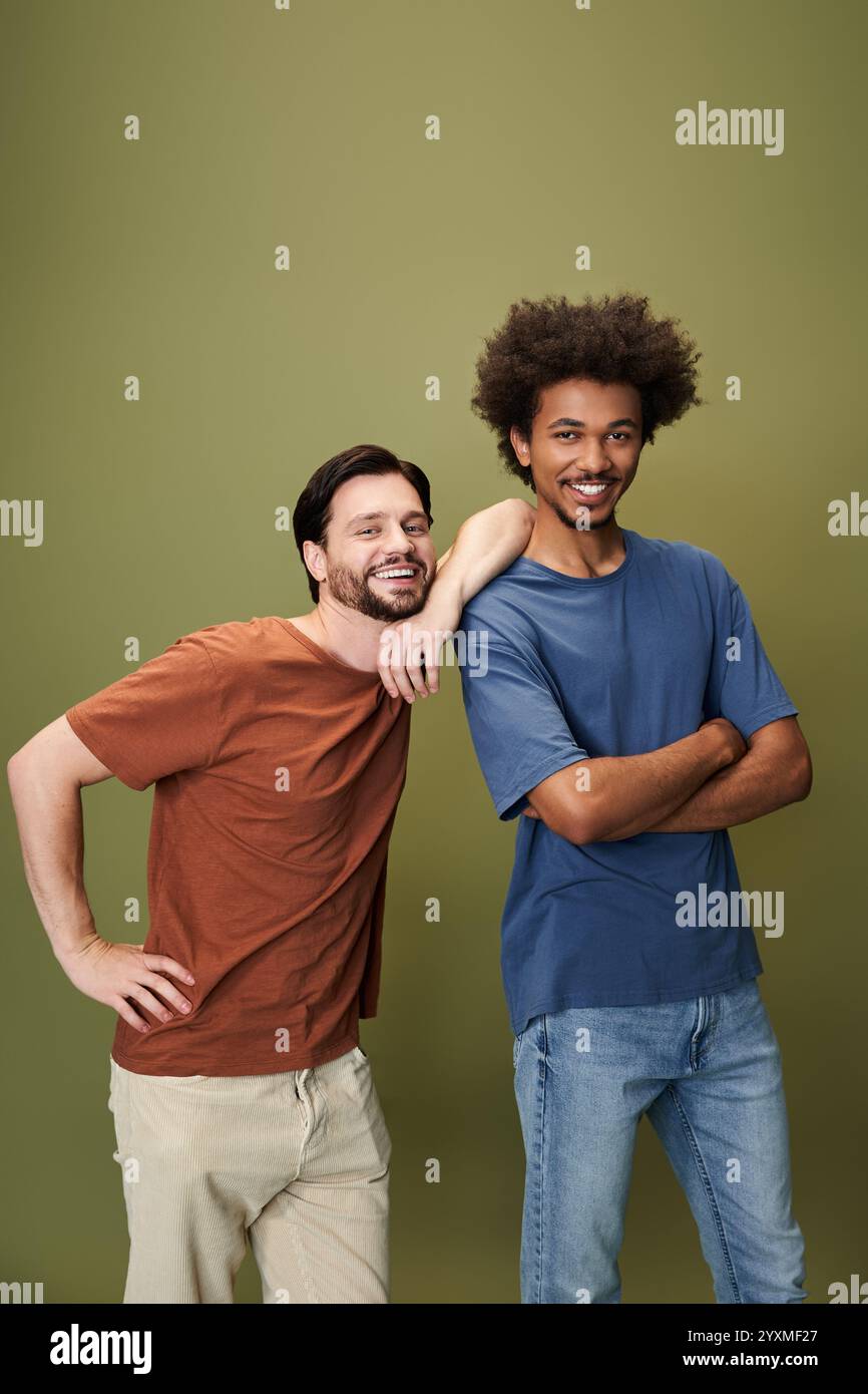 Two friends stand together, smiling and enjoying a lively moment in ...