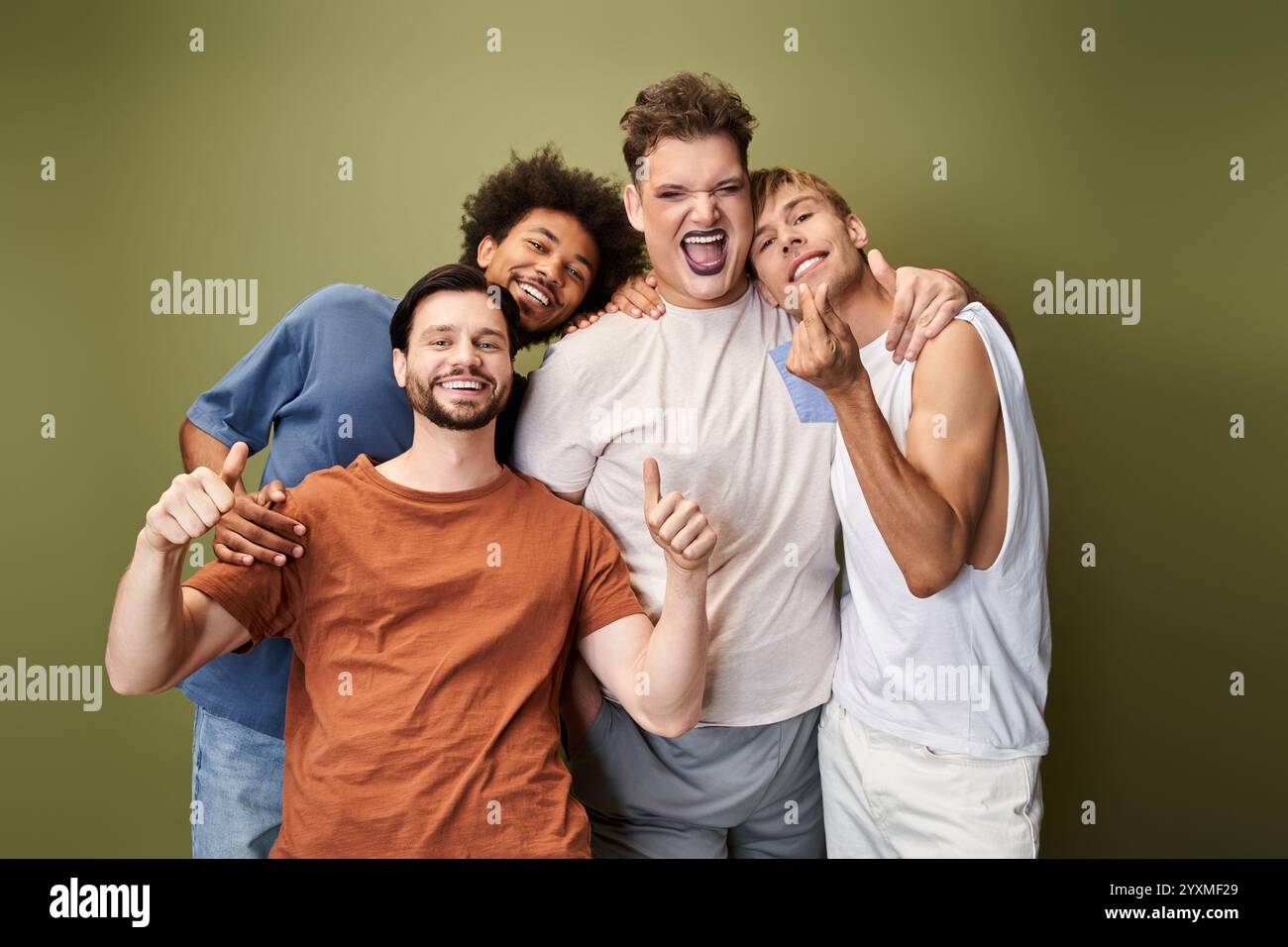 Four friends express joy and pride together, showcasing their vibrant ...