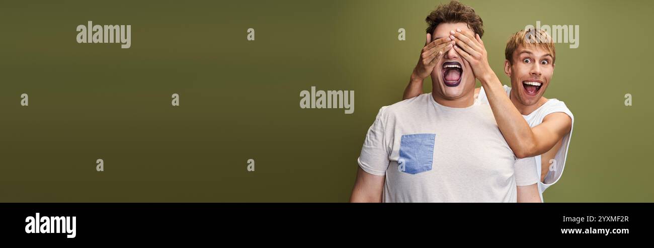 Two friends enjoy a joyful moment filled with vibrant emotions at a ...