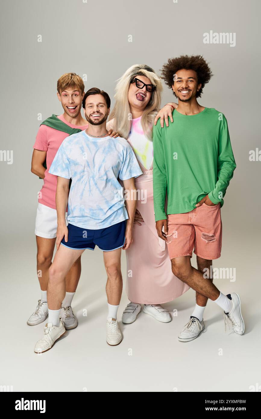 Four joyful individuals express their pride in colorful outfits while ...