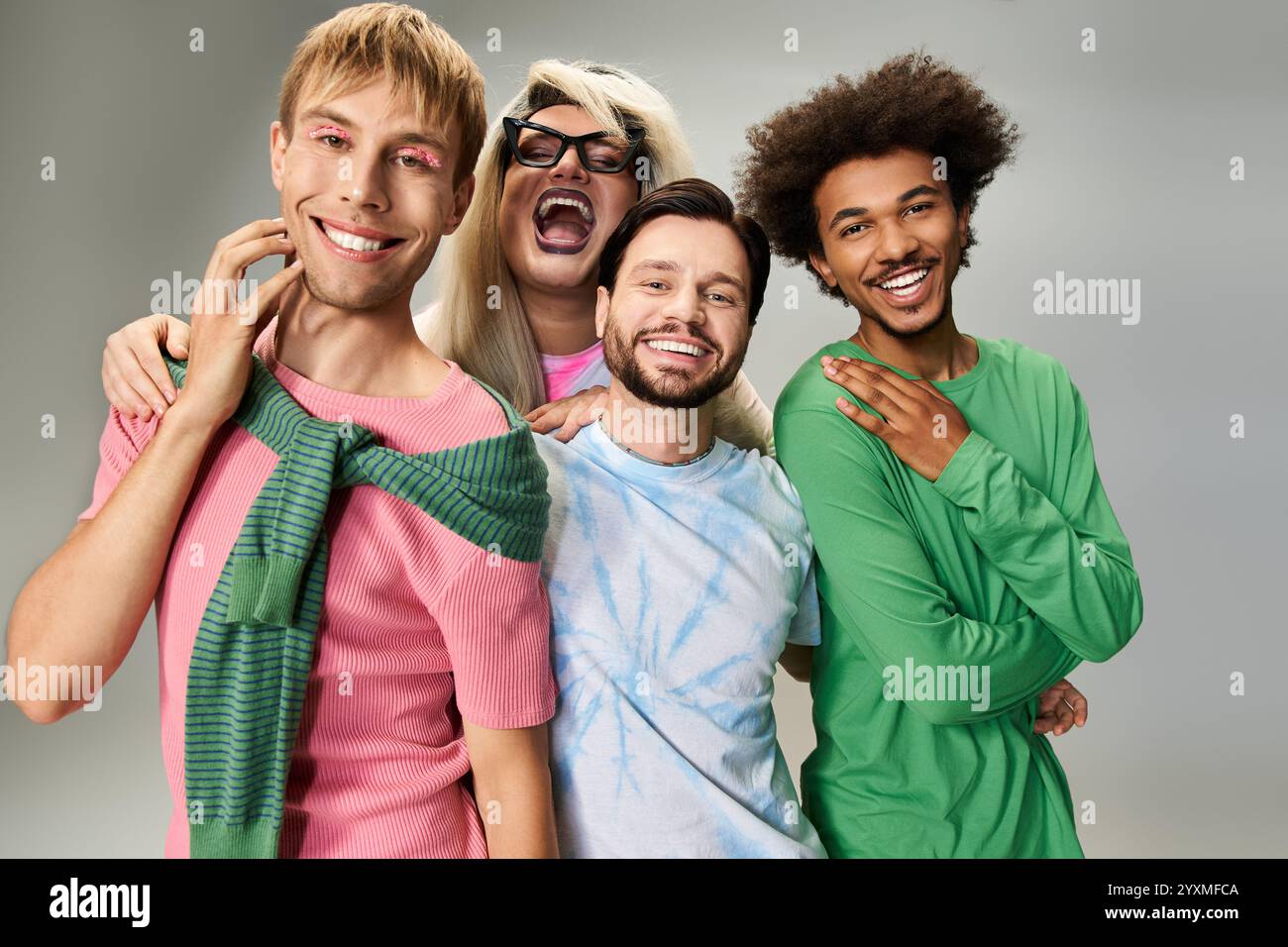 Friends dressed in colorful outfits express their joy and support for ...