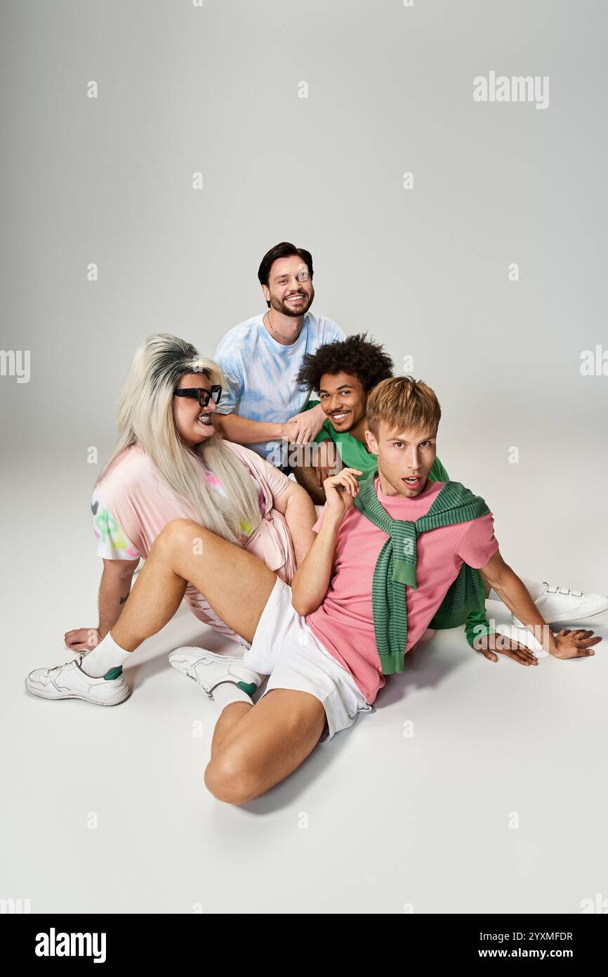Four friends joyfully pose in colorful outfits, showcasing their pride ...