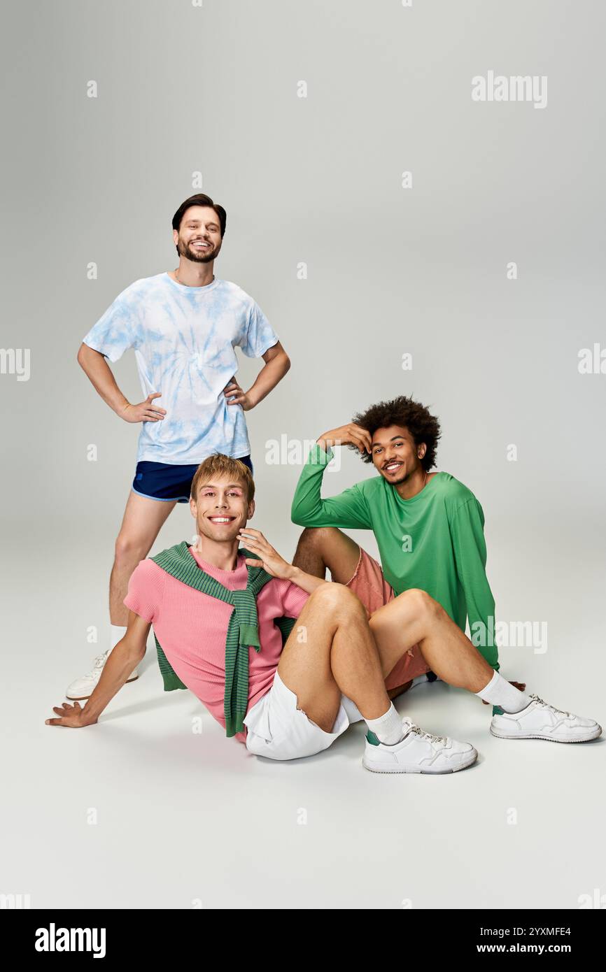 Three friends pose confidently in vibrant attire, celebrating their ...