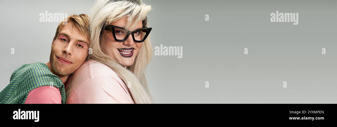 Two individuals showcase their vibrant personalities and joy, embracing ...