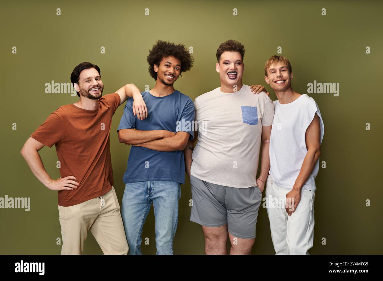Four queer friends stand together, sharing smiles and showing support ...