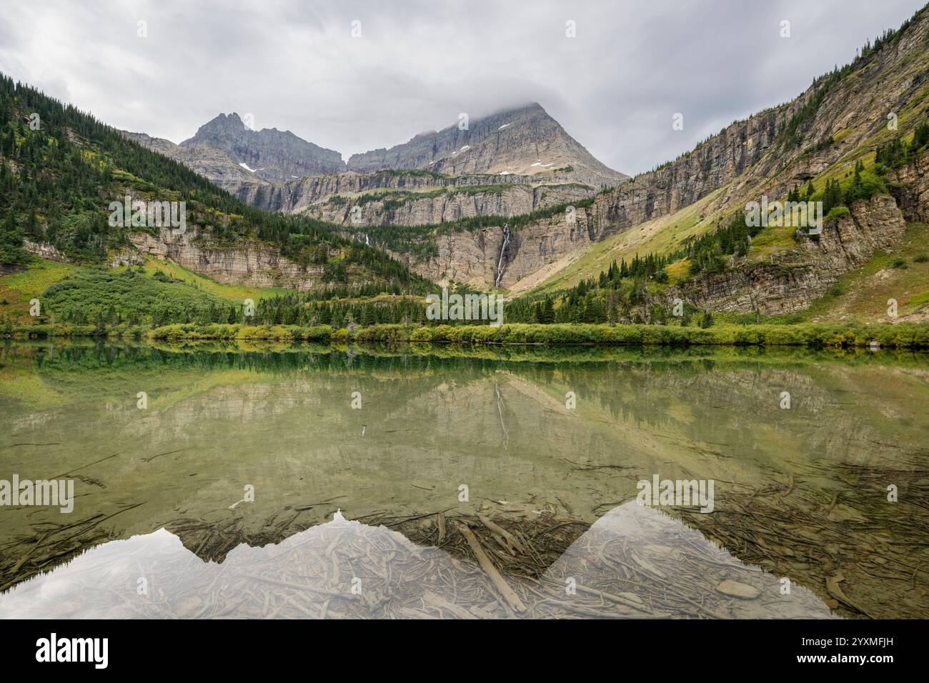 Atsina Lake, looking towards Cathedral Peak and Stoney Indian Pass ...
