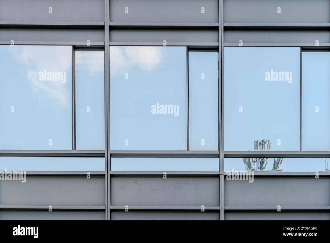 Architectural windows in Mies van der Rohe's Chicago office style, showcasing modern design's ...