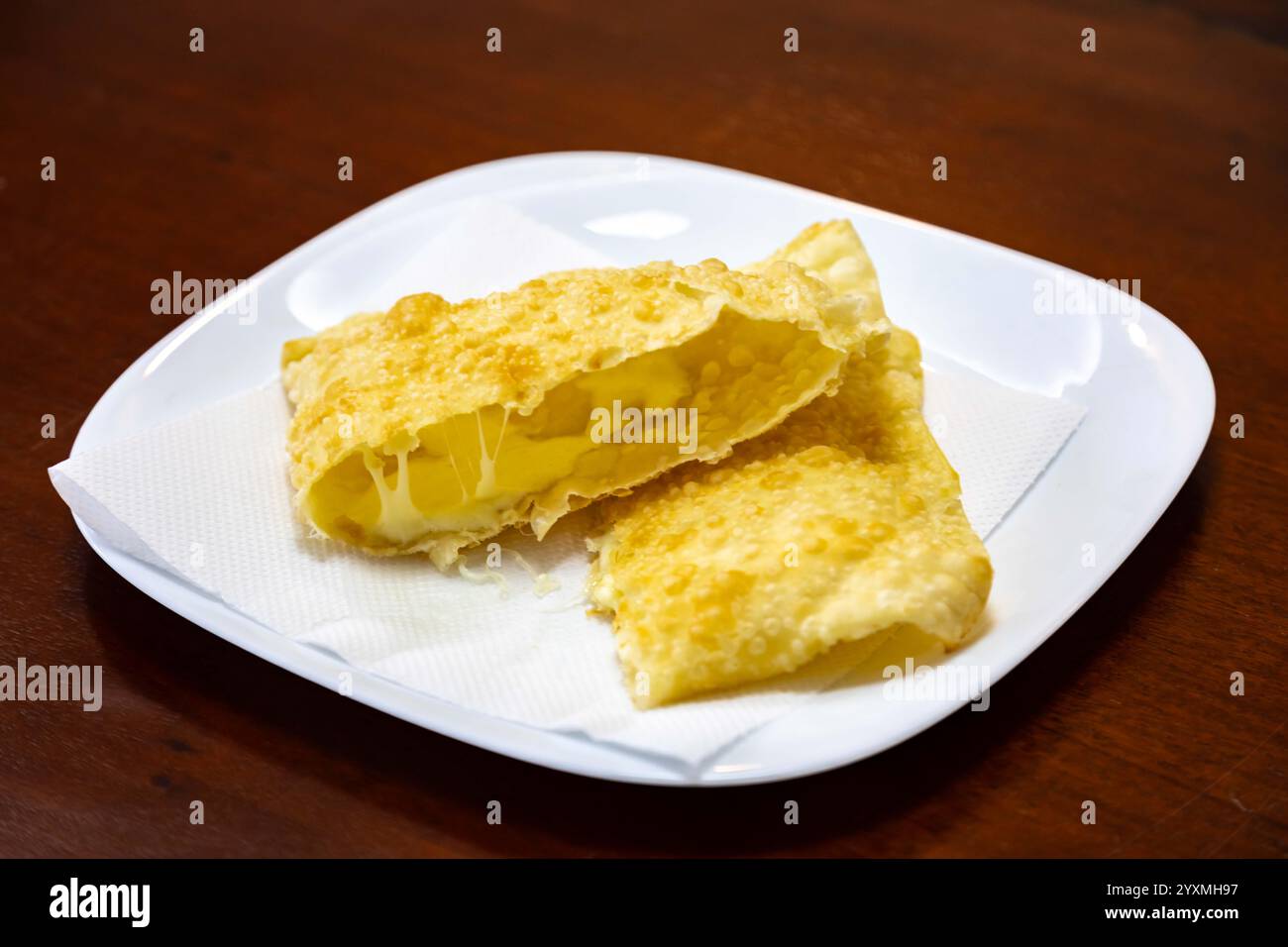 Traditional Brazilian fried cheese pastry known as pastel de feira ...