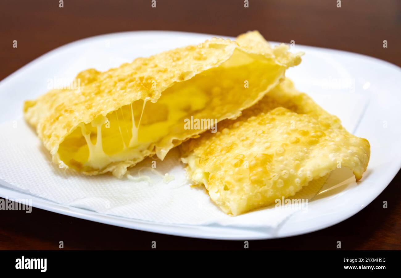 Traditional Brazilian fried cheese pastry known as pastel de feira ...