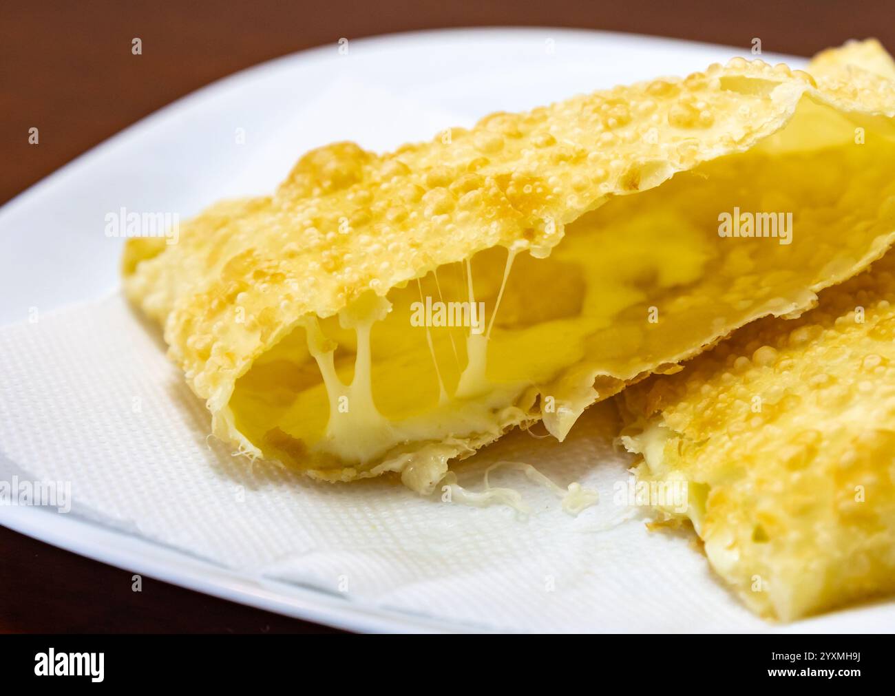 Traditional Brazilian fried cheese pastry known as pastel de feira ...