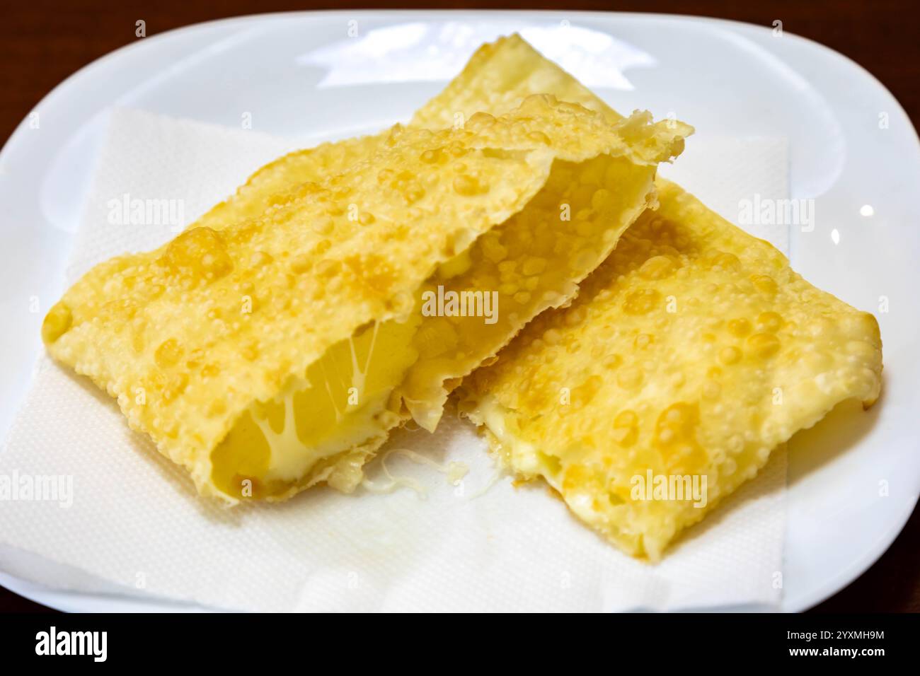 Traditional Brazilian fried cheese pastry known as pastel de feira ...