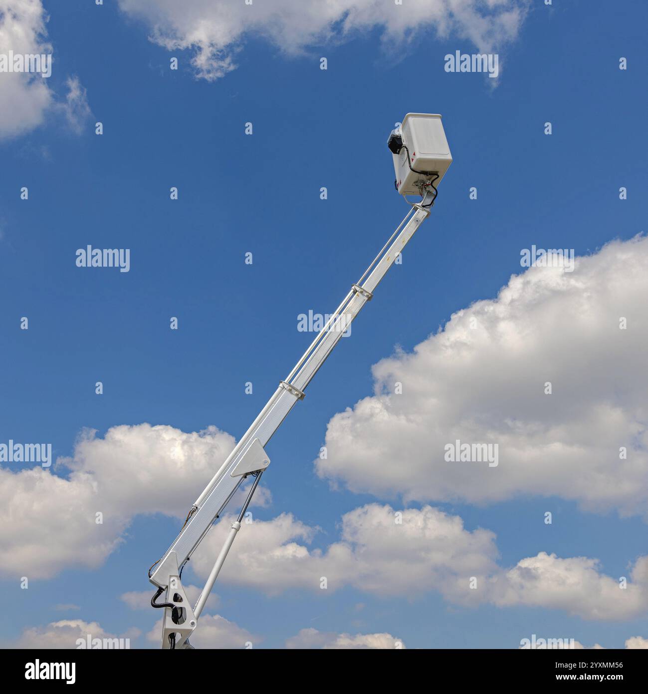 Long Boom Hydraulic Telescopic Aerial Work Platform High in Clouds Sky ...