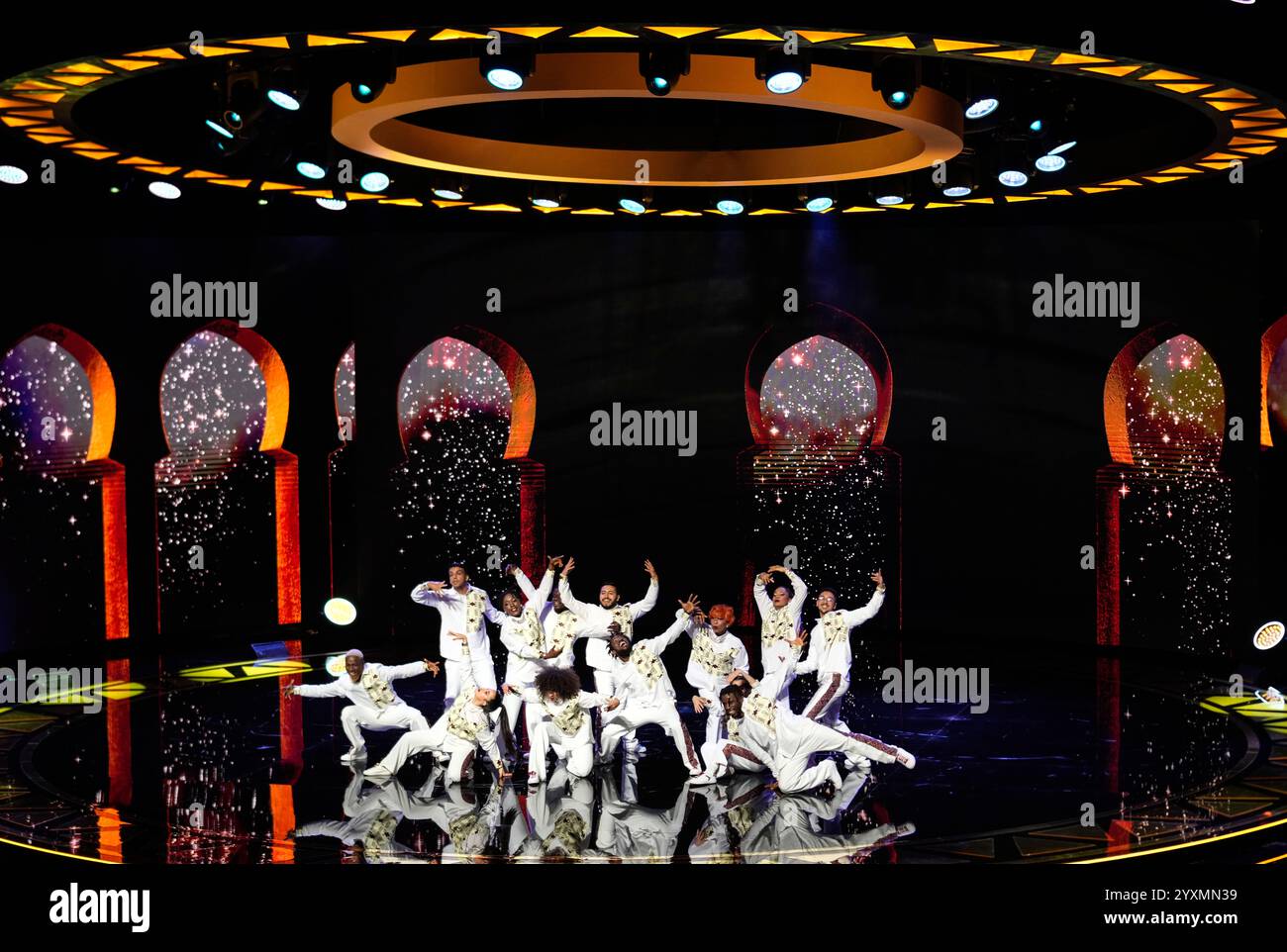 A band performs a choreography during the 2024 CAF Awards, in Marrakech ...
