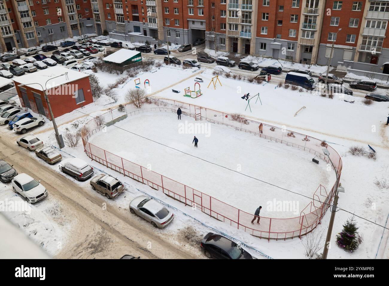 A beautiful Winter Scene featuring an ice rink, surrounded by ...