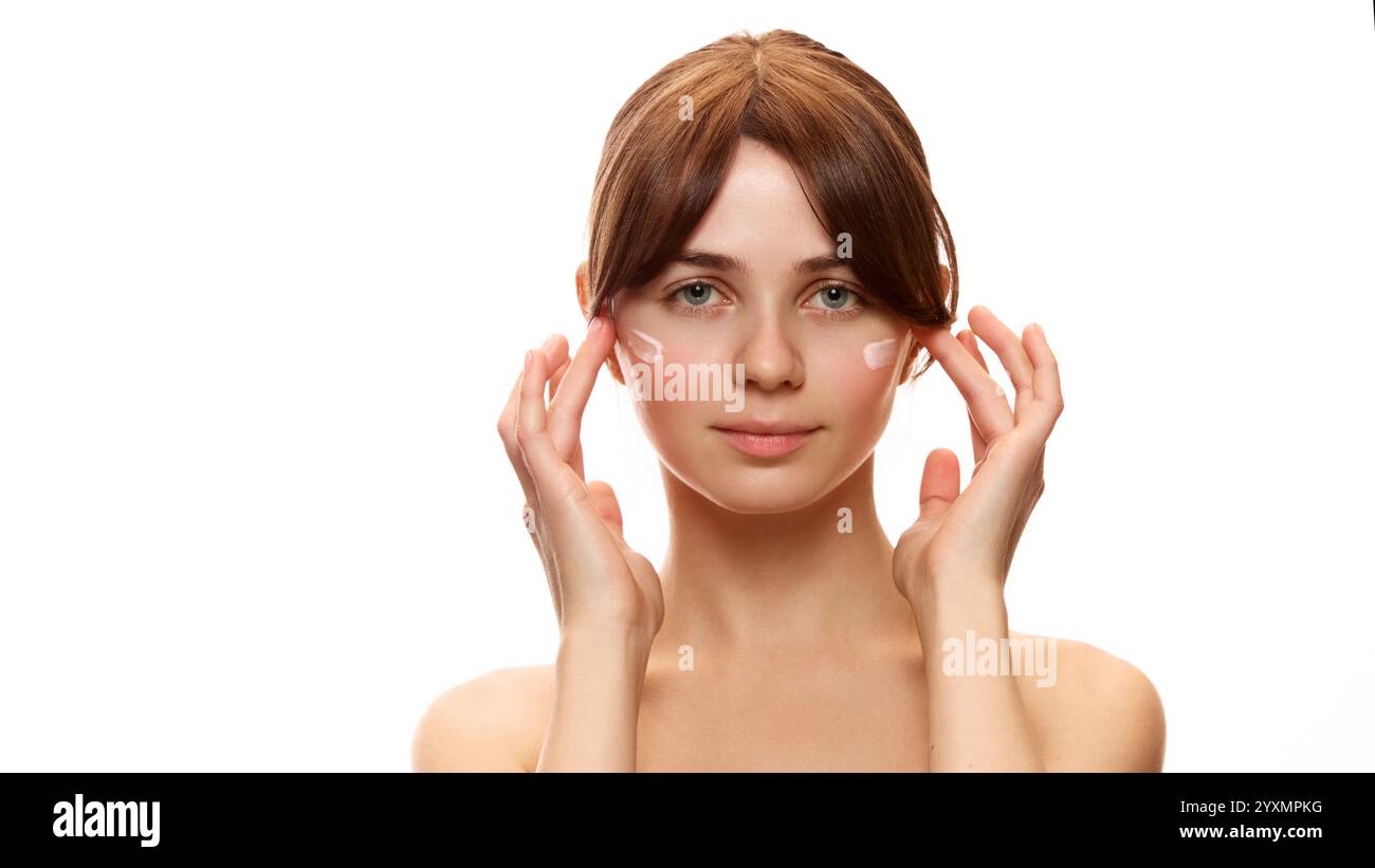 Attractive young woman with healthy, smooth, spotless skin and natural ...